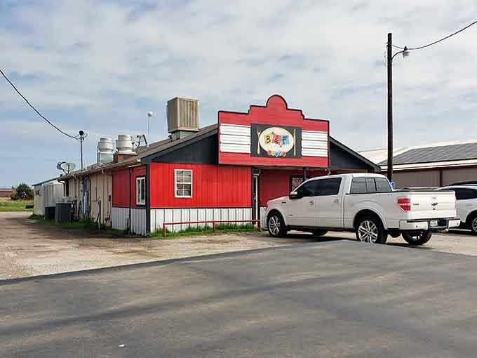 The quirky architecture and colorful facade promise burgers with personality to match the building's charm.