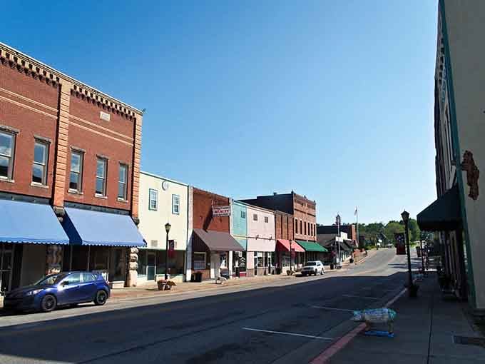 Colorful storefronts pop against historic brick, creating a streetscape that's both practical and downright photogenic for strolling.