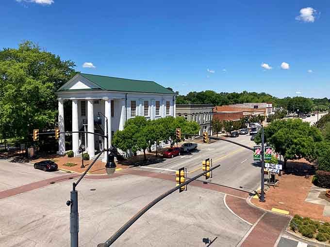 Those grand columns and tree-lined streets look like they're auditioning for every Southern movie ever made, honestly.