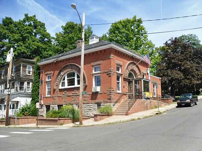 That handsome brick corner building with arched windows looks like it could tell a thousand delicious stories.