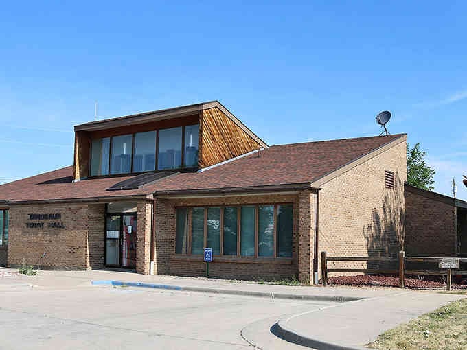 Modern architecture meets prairie practicality in this community building where locals gather and small-town democracy still thrives.