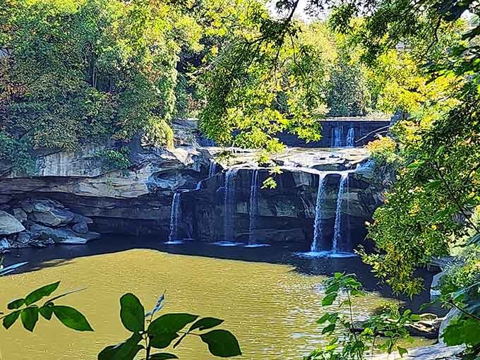 The surrounding greens paint the perfect frame around these tiered cascades flowing through the heart of town.