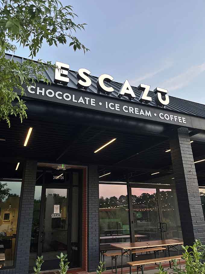 Sunset paints the sky while picnic tables beckon you to linger over artisan chocolates and premium coffee.