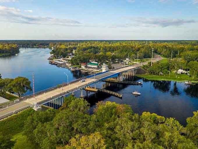 Lakes and greenery stretch to the horizon, showing off the agricultural heart of a region where nature and community blend seamlessly together.
