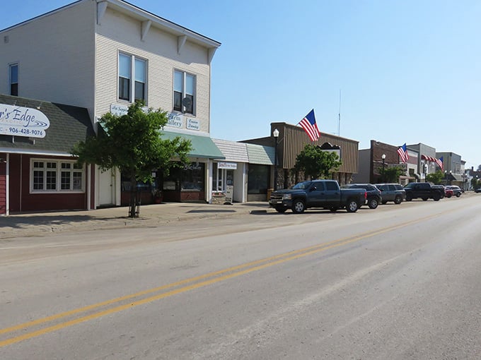 Small-town businesses line up like old friends, each storefront offering its own slice of local character and charm.
