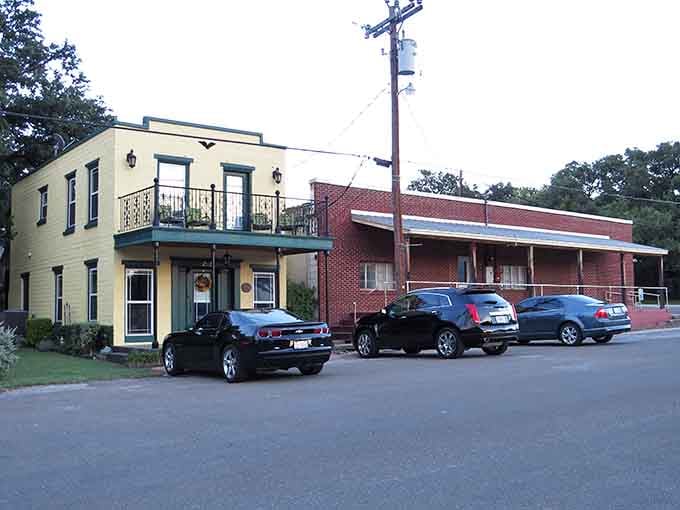 Small-town Texas at its finest, where a balcony and brick buildings create postcard-perfect afternoon wandering.