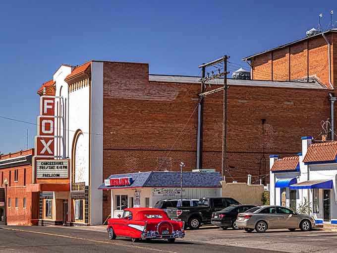 Weathered brick buildings wear their history proudly along this downtown stretch where time moves at a gentler pace.