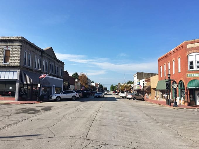 Wide streets and brick storefronts stretch toward the horizon, inviting leisurely strolls without a single parking meter in sight.