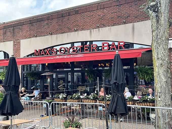 The outdoor patio setup shows this place understands that fresh air makes oysters taste even better than usual.