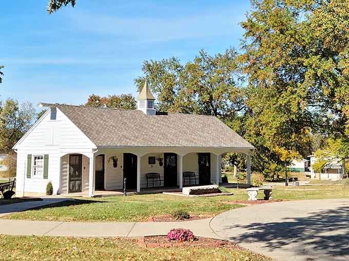 The charming cottage sits perfectly positioned, looking like it wandered off a greeting card into real life.