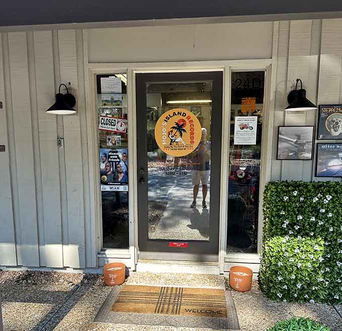 Those potted plants and welcome mat invite you into a world where every record tells a sun-soaked story.