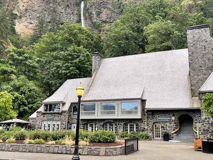 The lodge's storybook architecture nestled in greenery looks like something from a classic National Parks postcard.