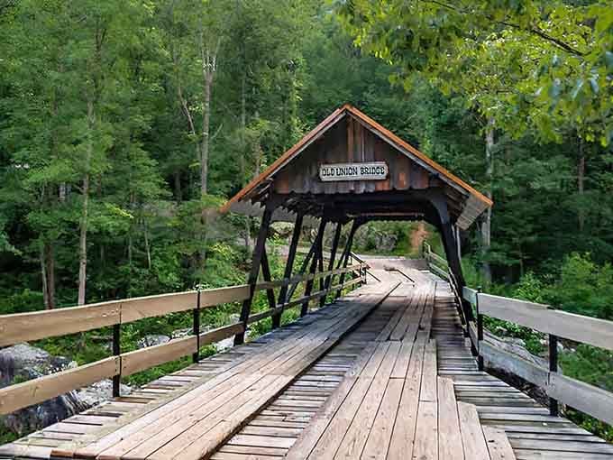 The weathered gray-brown exterior tells stories of countless seasons and visitors who've passed through these beams.