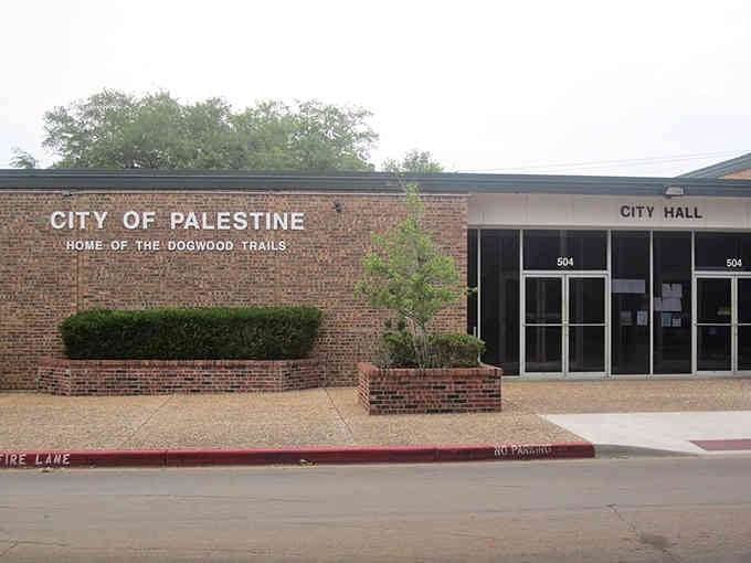 Palestine City Hall proudly declares itself home of the Dogwood Trails, celebrating the natural beauty that makes this town so special.
