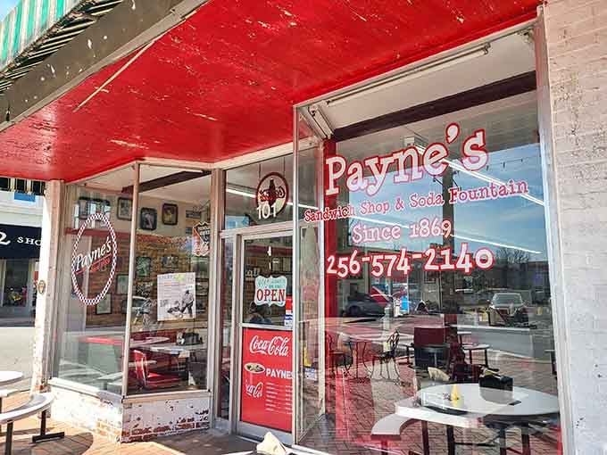 The bright red awning practically shouts "come get your ice cream!" louder than any billboard ever could dream of.