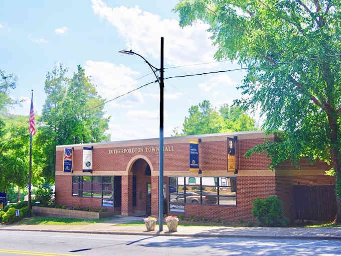 The Rutherfordton Town Hall stands proud in brick, a testament to small-town America's enduring architectural dignity and grace.