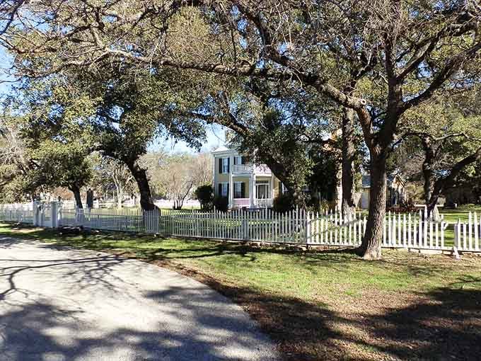 White picket fences and towering oaks create a scene so idyllic, Norman Rockwell would grab his paintbrush.