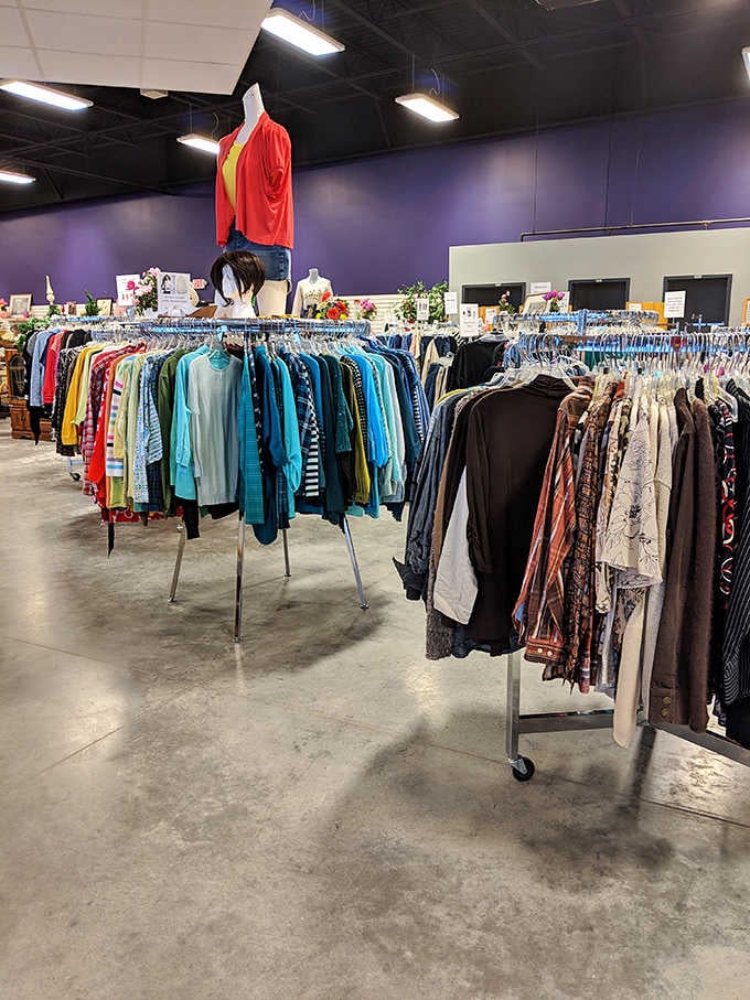 Circular clothing racks create a shopping experience that feels more like a fashion show than a rummage sale from days past.