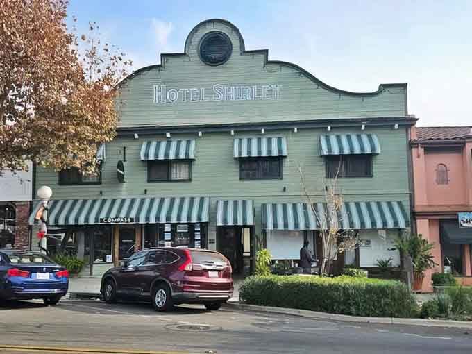 Historic Hotel Shirley's mint-green facade and striped awnings evoke an era when small-town dining meant something special and personal.