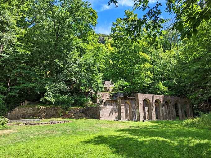 Ancient stonework nestled in lush greenery creates a fairy-tale scene along the mountain's peaceful trails.