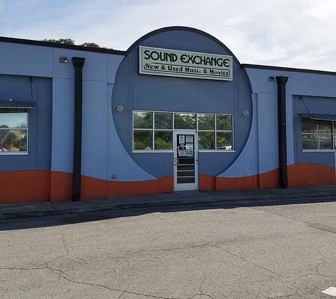 The building wears its record-shaped design proudly, like a badge of honor in Tampa's ever-changing retail landscape.