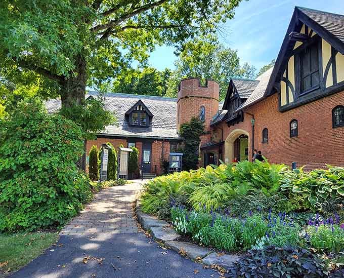 Shaded pathways wind through the estate's gardens, inviting leisurely strolls through meticulously maintained grounds and hidden corners.