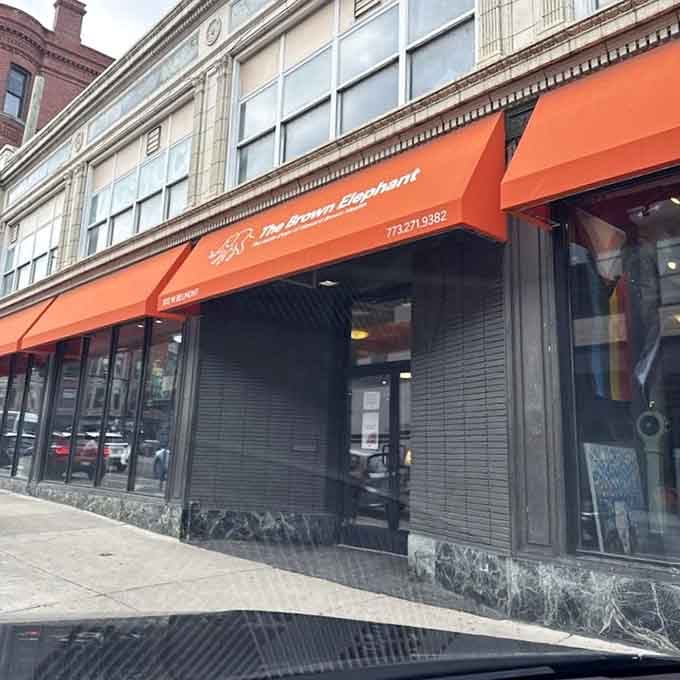 That striking orange awning stands out on the street, marking the spot where bargains meet community support beautifully.