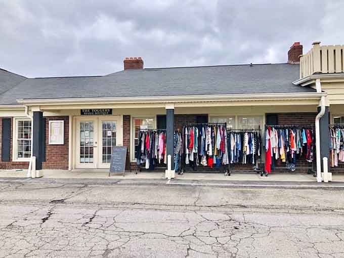 Racks of colorful clothing spill onto the covered walkway, teasing passersby with glimpses of the bargains waiting just inside.