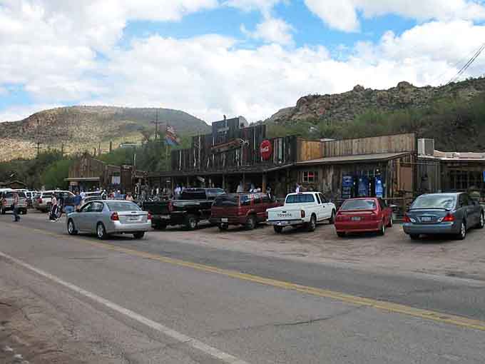 Cars line the street of this mountain town where Old West charm still draws modern-day explorers.