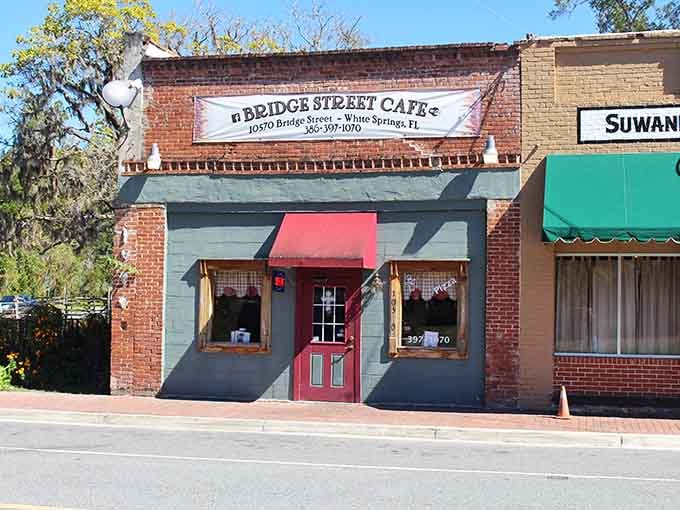 That red door on brick says "come in, we've been expecting you" in the most charming way.