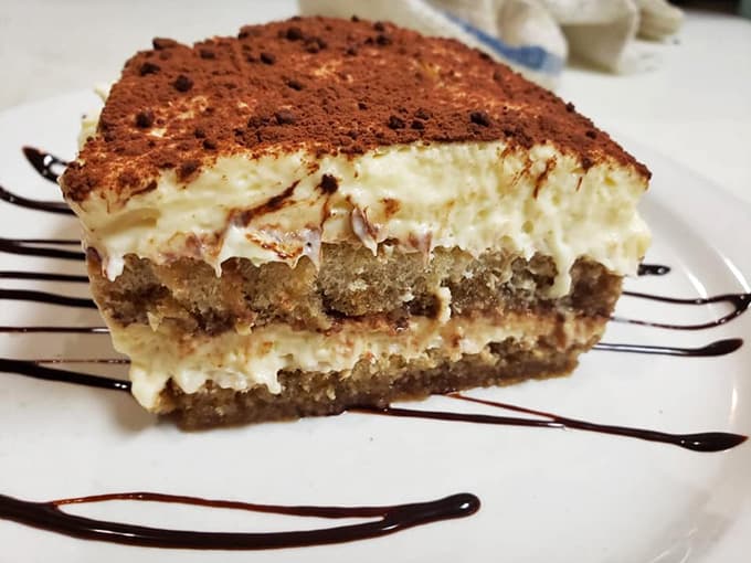 Layers of coffee-soaked ladyfingers and mascarpone that'll transport you straight to an Italian caf&eacute; instantly.