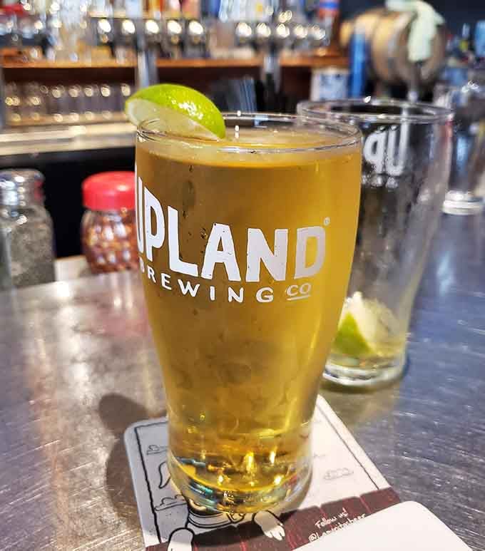 Local craft beer with a lime wedge makes the perfect companion for whatever pizza adventure you choose.