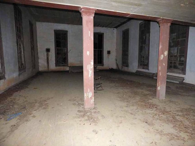 Empty rooms echo with silence louder than any sermon, their pink pillars standing like sentinels over forgotten gatherings.