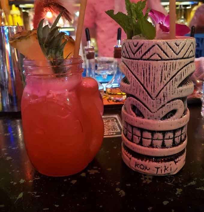 Two cocktails that look like they're competing for "Most Likely to Transport You to Another Dimension" award.