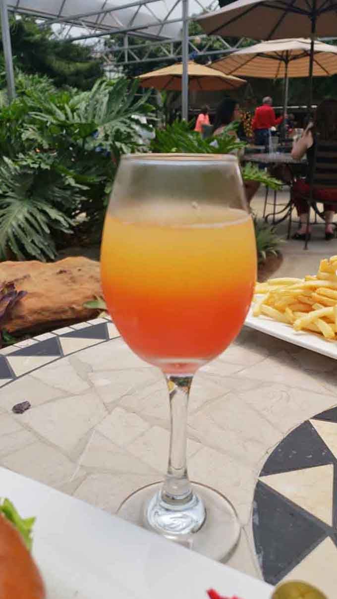 This sunset-in-a-glass situation is exactly what you need when the West Texas heat gets a little too personal.