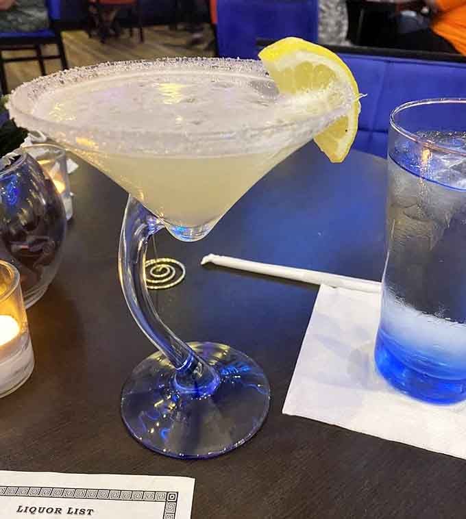 That lemon martini is so perfectly balanced it could teach a yoga class while simultaneously making all your worries evaporate instantly.