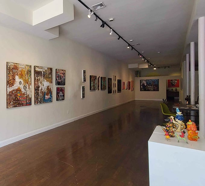 Gallery walls showcase vibrant contemporary art in clean white spaces that let creativity breathe and imaginations run absolutely wild.