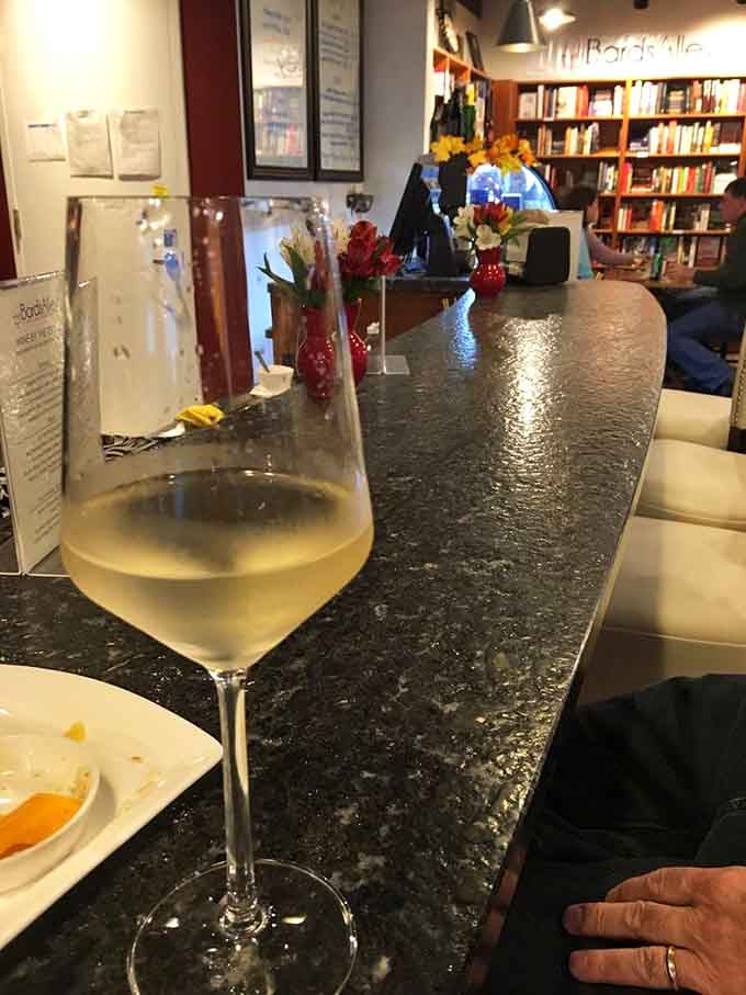 Because browsing books pairs wonderfully with a glass of wine, civilized people have always known this.