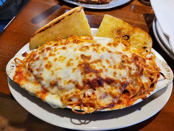 Spaghetti with garlic bread towers proves Bearno's understands that carbs plus carbs equals pure mathematical joy.