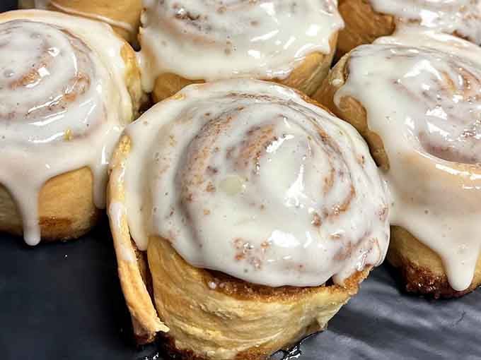 Cinnamon rolls so generously frosted they'd make Cinnabon jealous, perfect for your mid-morning plot twist.