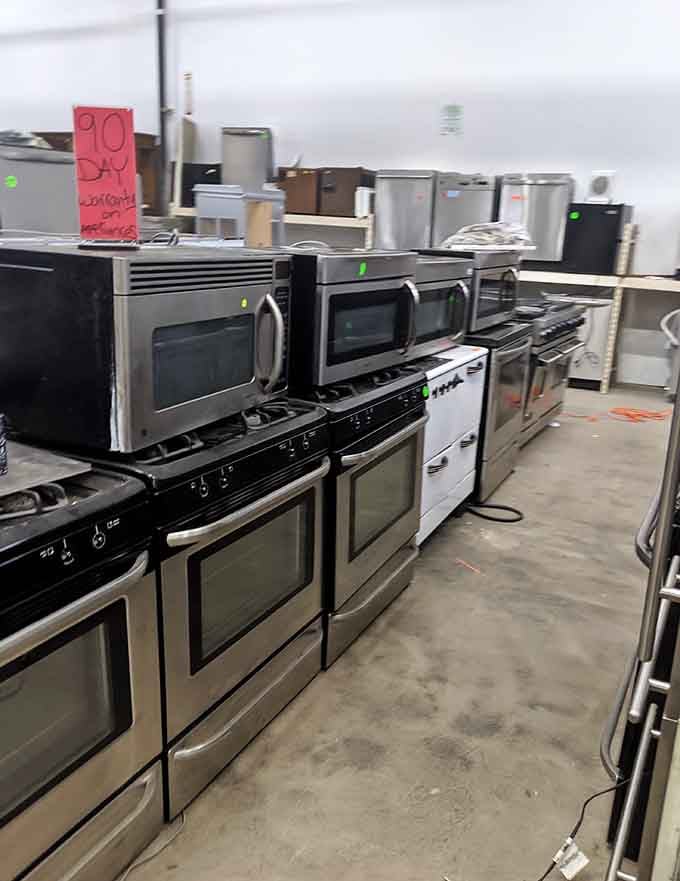 Rows of working appliances proving that one person's kitchen upgrade is another's culinary dream come true.