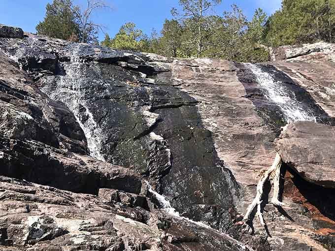 The layered rock formations reveal millions of years of geological history in shades of rust and stone.