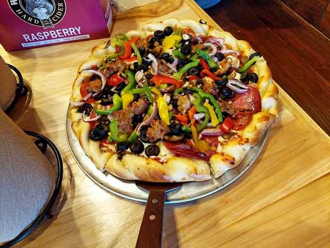 Colorful peppers and sausage create a pizza that's basically edible confetti for your taste buds right now.