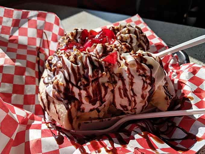 This banana split doesn't apologize for the chocolate drizzle, whipped cream, or cherry on top of everything good.