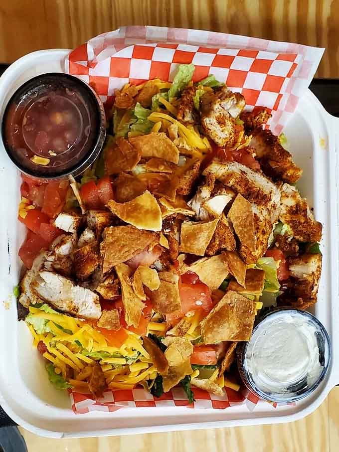 This taco salad loaded with grilled chicken and tortilla strips makes healthy eating look downright irresistible and fun.