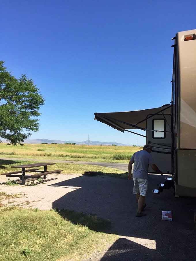 RV sites with mountain views in the distance, combining camping comfort with lakeside convenience perfectly.