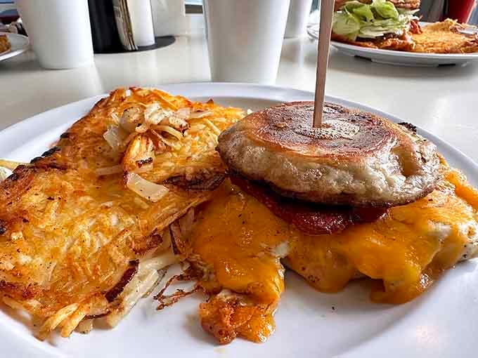 Linguica and eggs with hash browns&mdash;a Portuguese-American breakfast marriage that proves fusion cuisine existed long before it was trendy.