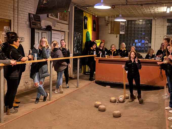Nothing brings people together quite like trying to master a sport that involves rolling balls at feathers while laughing hysterically.