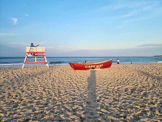 That classic red lifeboat and lifeguard stand combo screams summer louder than any radio hit ever could.