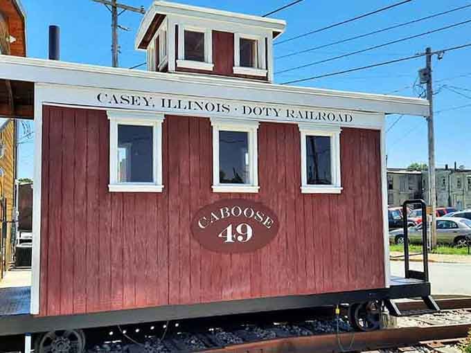 This vintage red caboose adds railroad nostalgia to Casey's collection, proving big things come in traditional packages too.